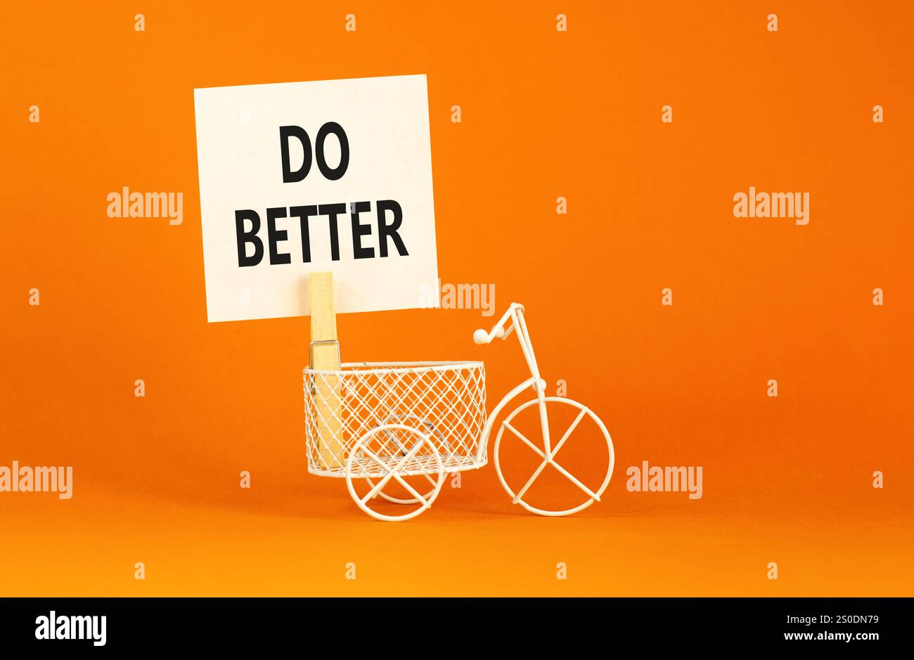 Do better symbol. Concept words Do better on beautiful white paper on ...