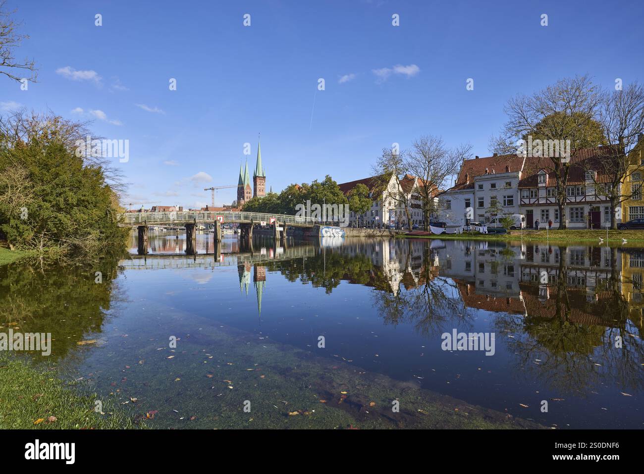 River Trave at high water, general architecture, pedestrian bridge ...