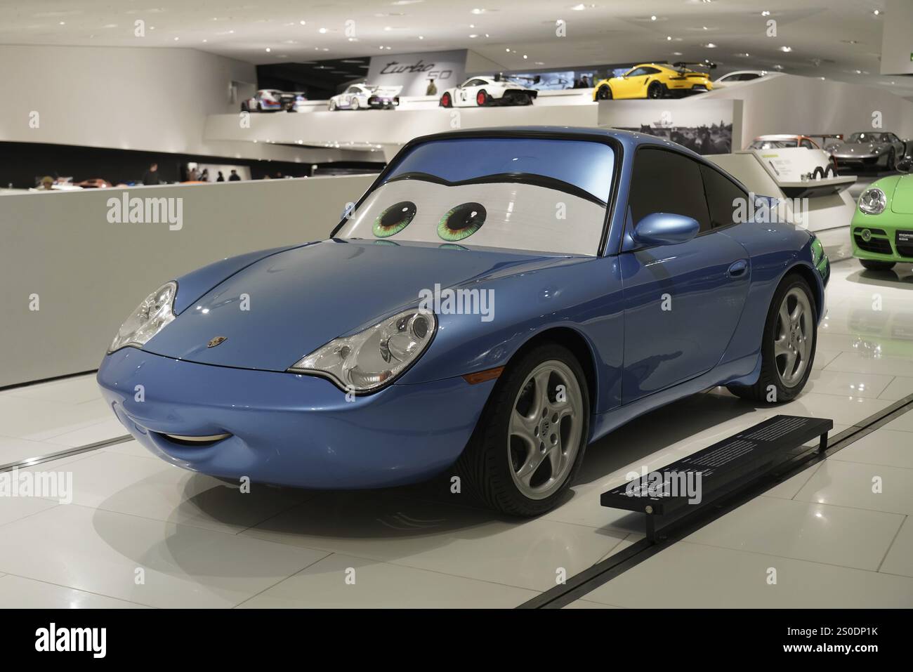 Porsche 911 Sally Carerra, Blue car with cartoon face that smiles and ...