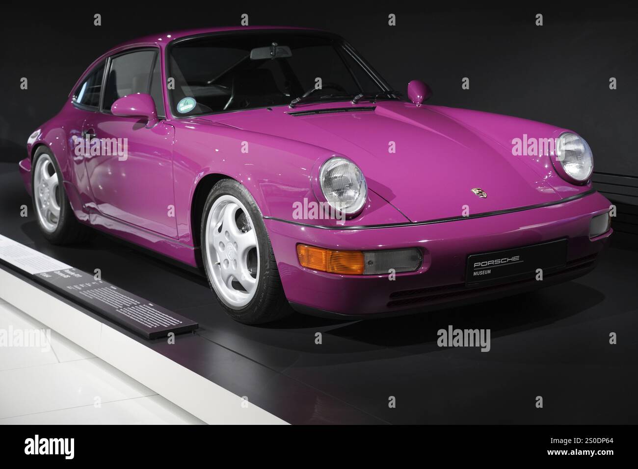 Porsche 911 Carerra RS, Pink Porsche in retro design presented in a ...