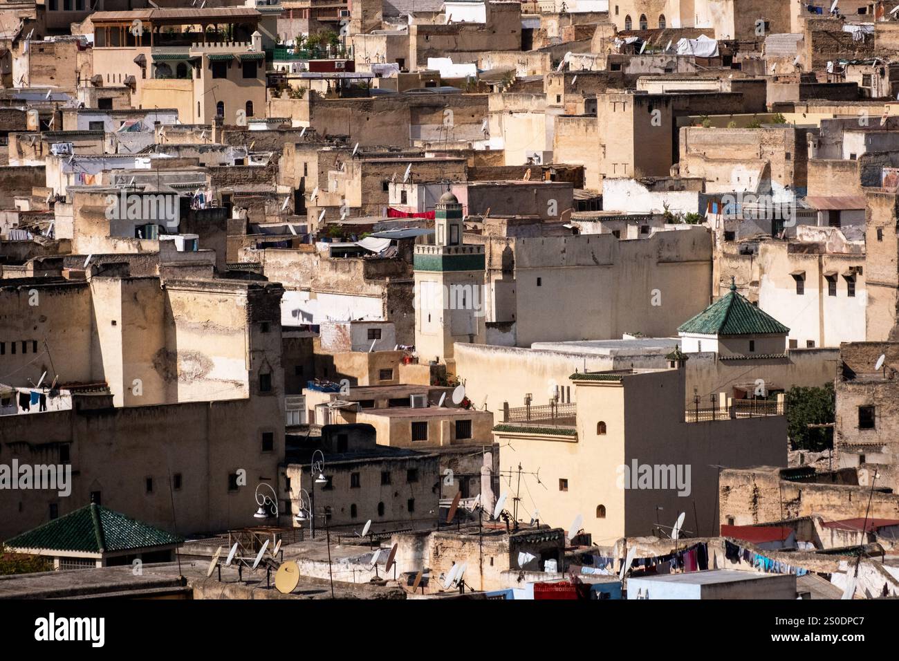 Landscape of the medina in Fes with mosque minaret in Morocco on 2 ...