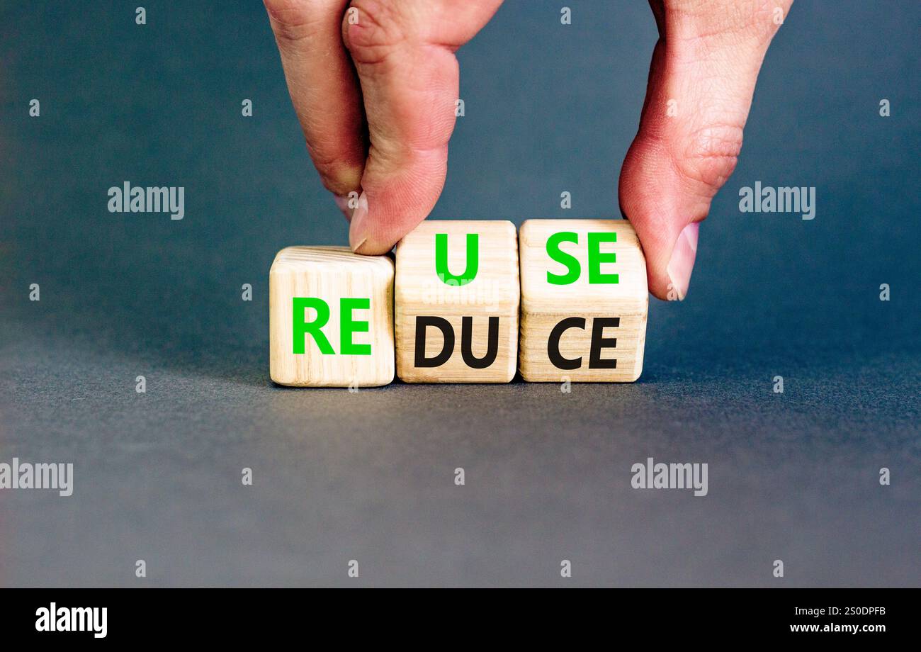 Reuse or reduce symbol. Concept words Reuse Reduce on wooden block ...