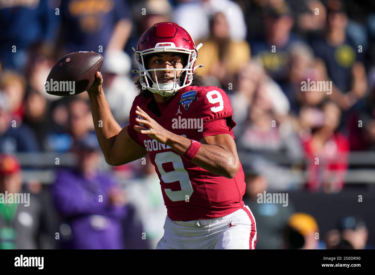 Oklahoma quarterback Michael Hawkins Jr. looks to pass against Navy ...