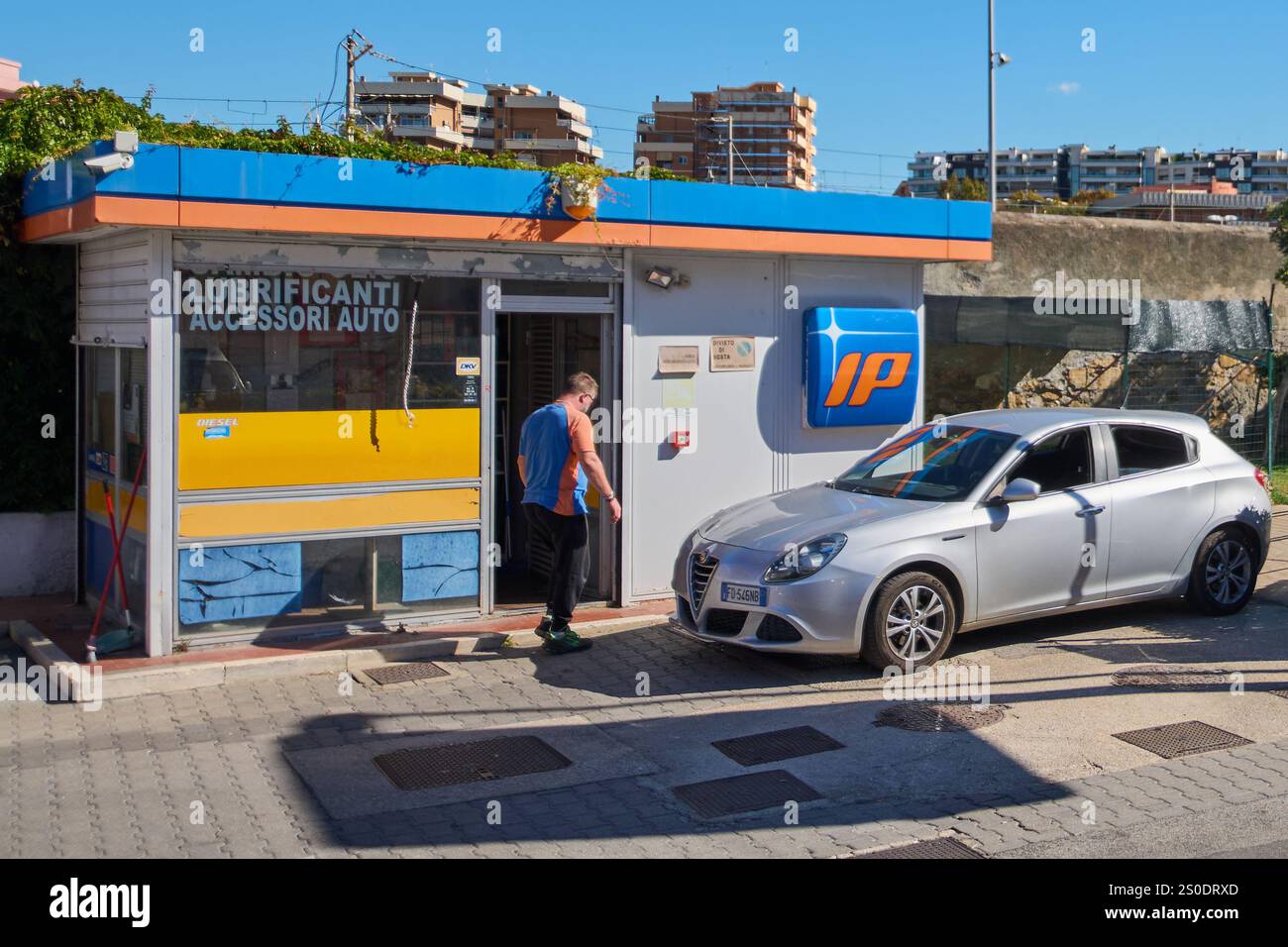 Civitavecchia. Italia - December 27, 2024: Exterior of IP gas station ...