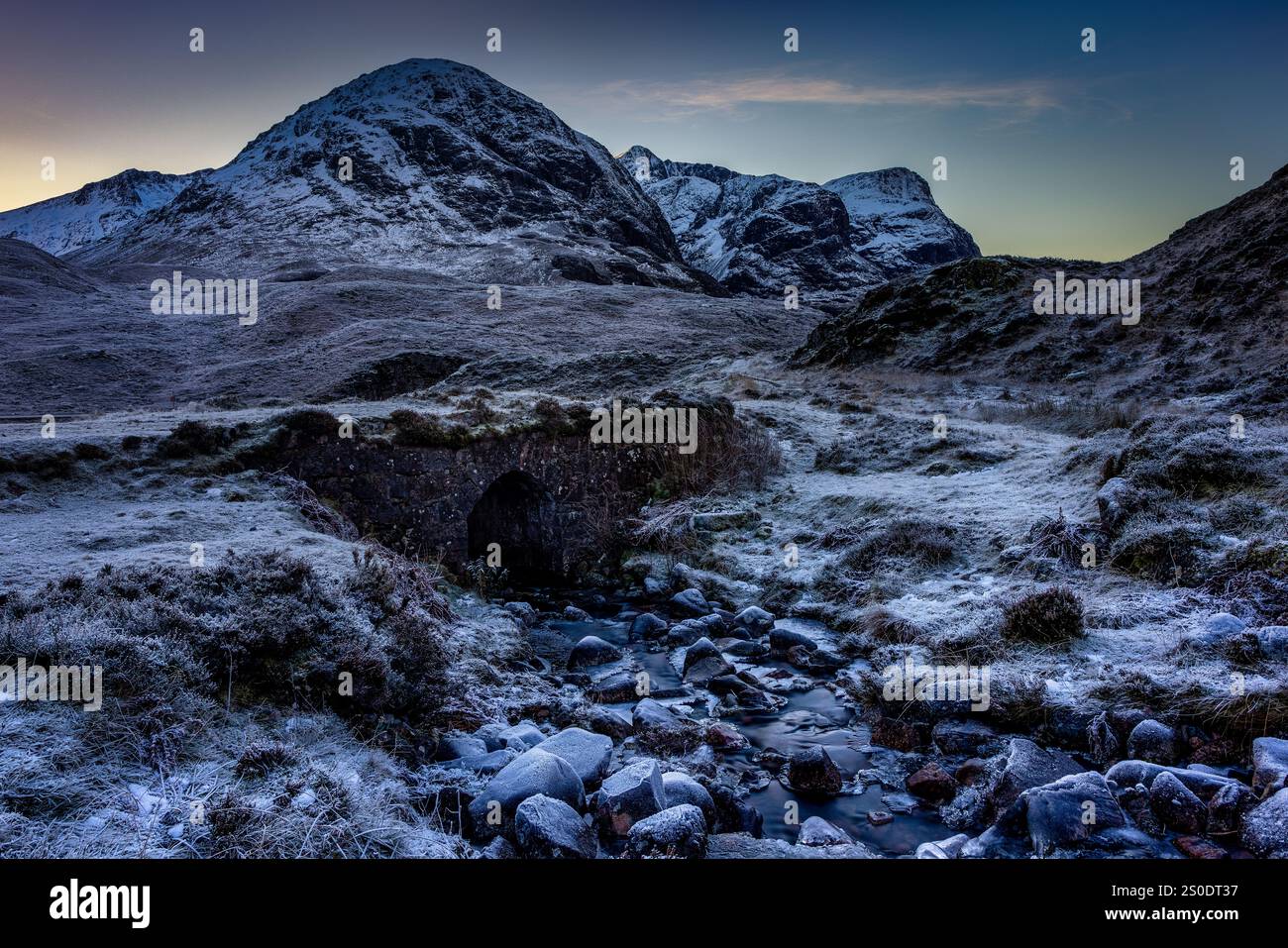 Winter in Glencoe, Scotland, looking over the Old Military Road to the ...