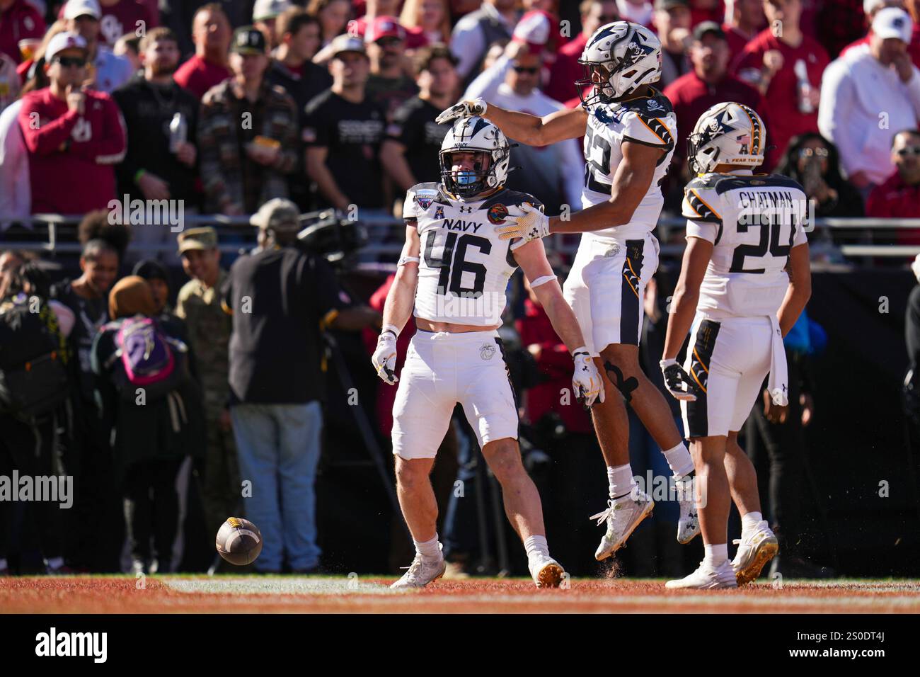 Navy fullback Alex Tecza, (46) celebrates his touchdown run with ...