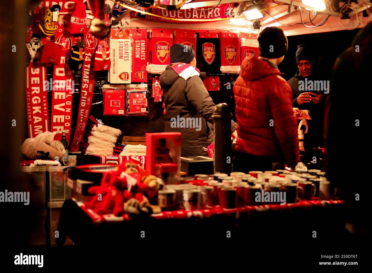 London, UK. 27th Dec, 2024. A stall selling Arsenal merchandise ahead ...
