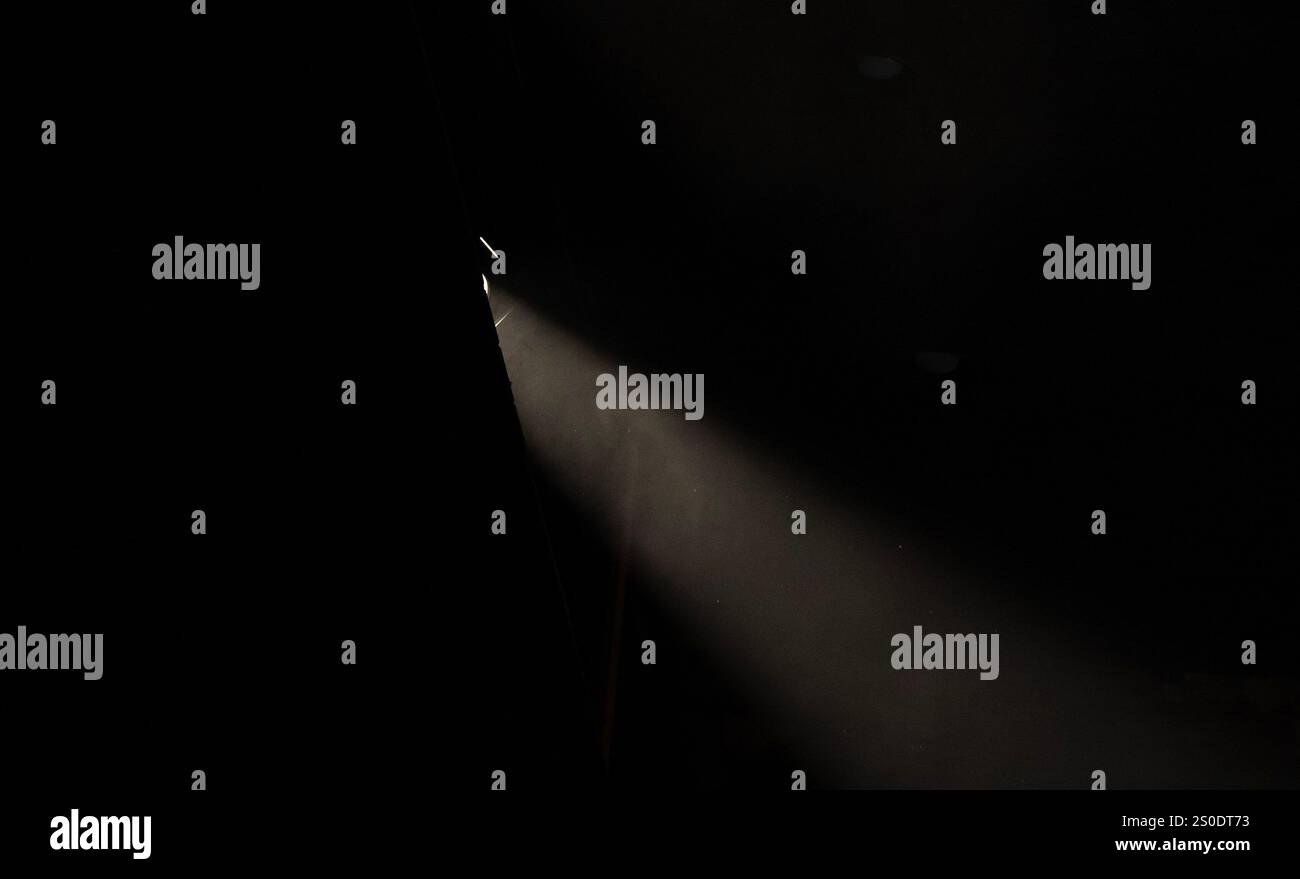 Beam of Light: Illuminating the Darkness Stock Photo - Alamy