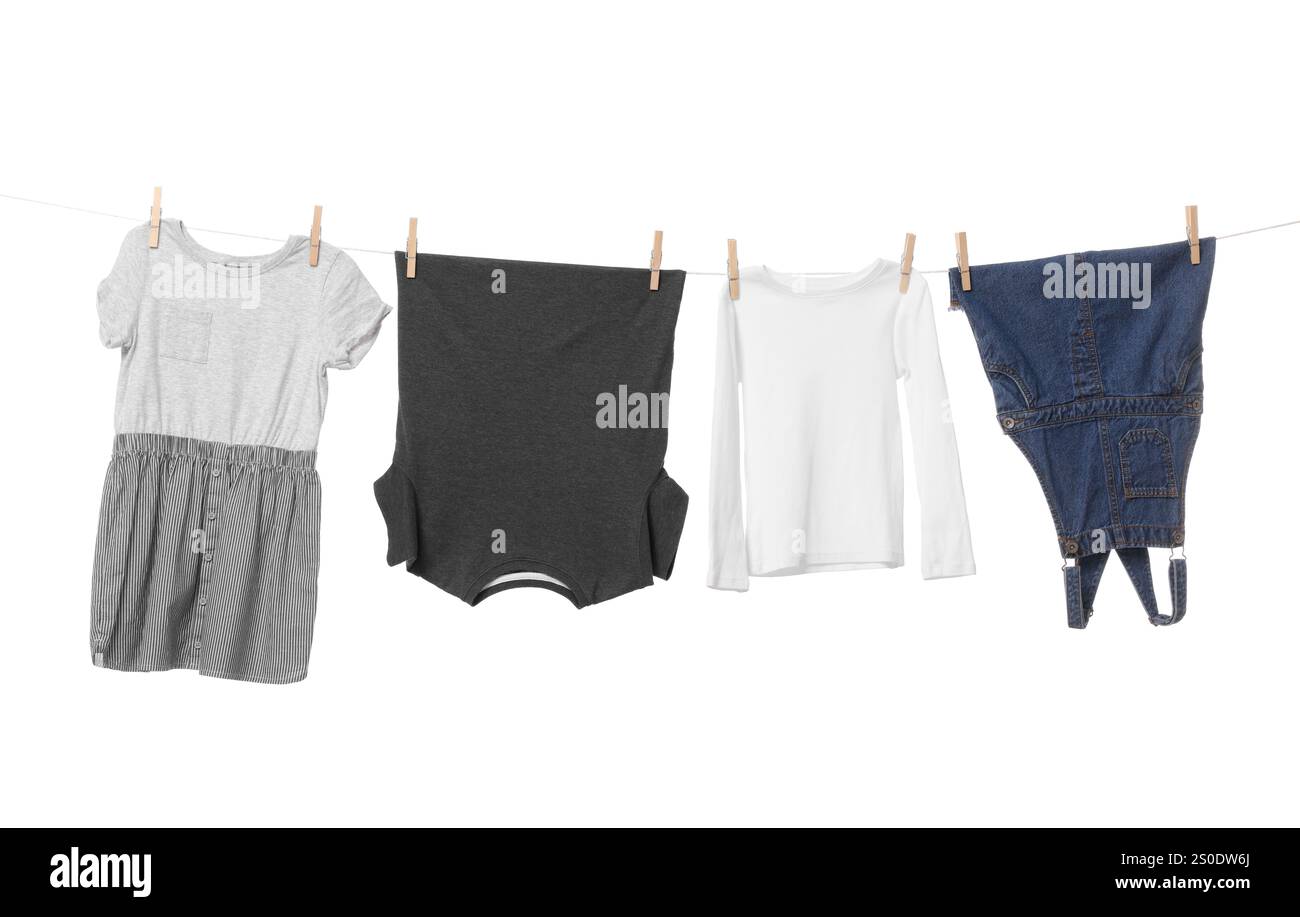 Different clothes drying on laundry line against white background Stock ...