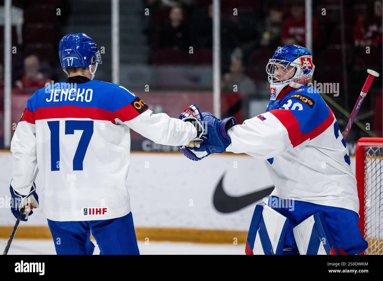 241227 Daniel Jencko celebrates with goaltender Samuel Urban of ...