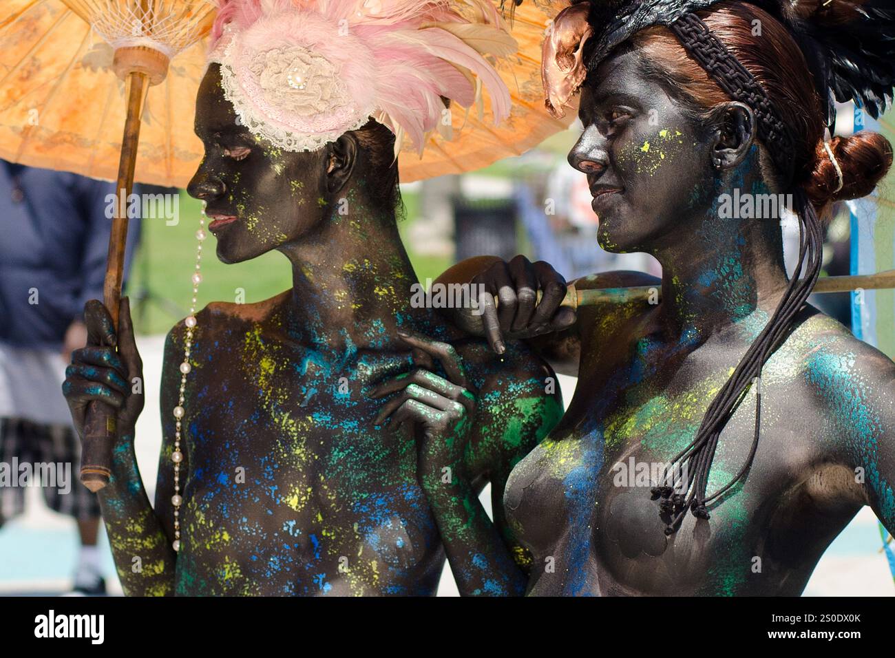 Captivating bodypaint art by Trina Merry transforms models into living canvases, blending ...