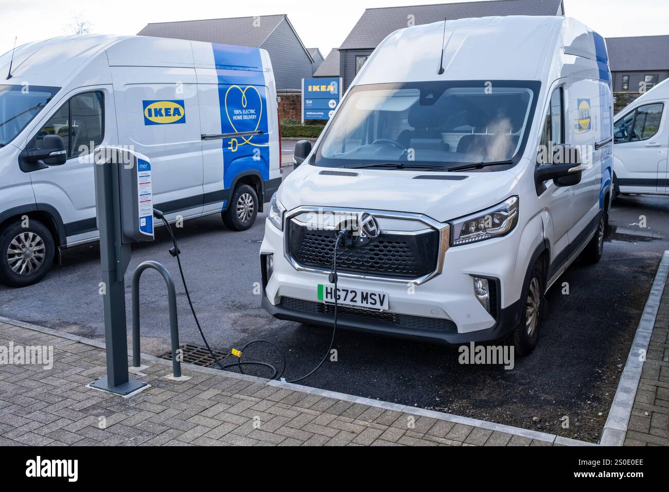 Ikea Electric Vans at Charging Station in Cardiff UK Stock Photo - Alamy
