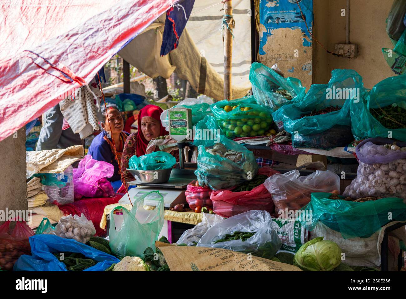 Nepali women selling goods and produce at a local market, Panauti ...