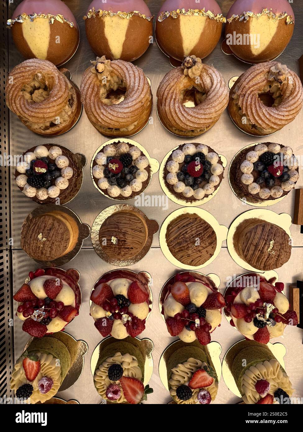 Types of cakes. Delicious cakes in bulk at the patisserie counter. For ...