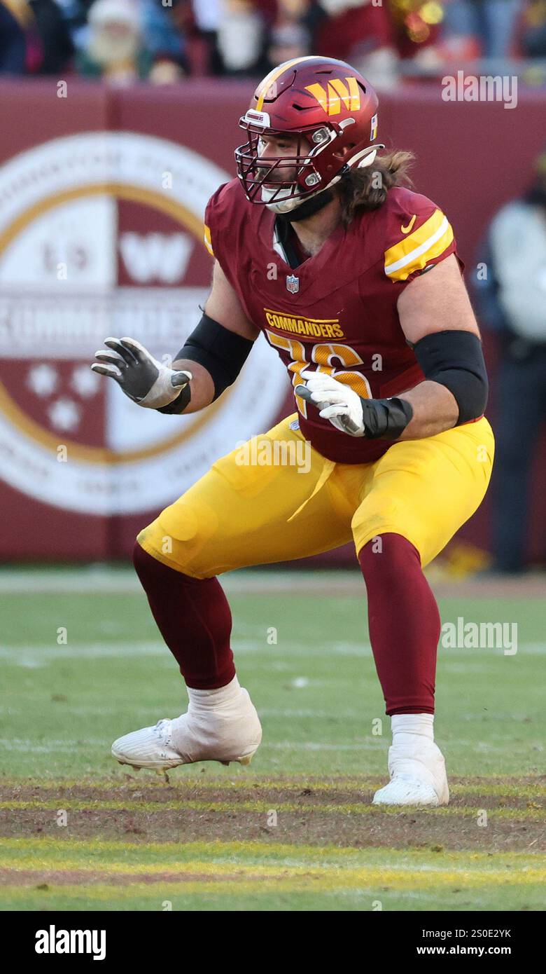 Washington Commanders guard Sam Cosmi (76) blocks during an NFL ...