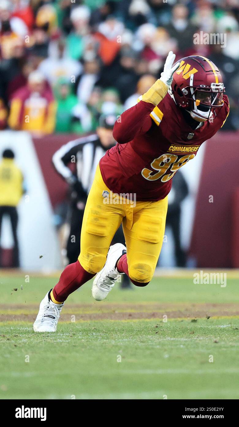 Washington Commanders defensive end Clelin Ferrell (99) rushes during ...