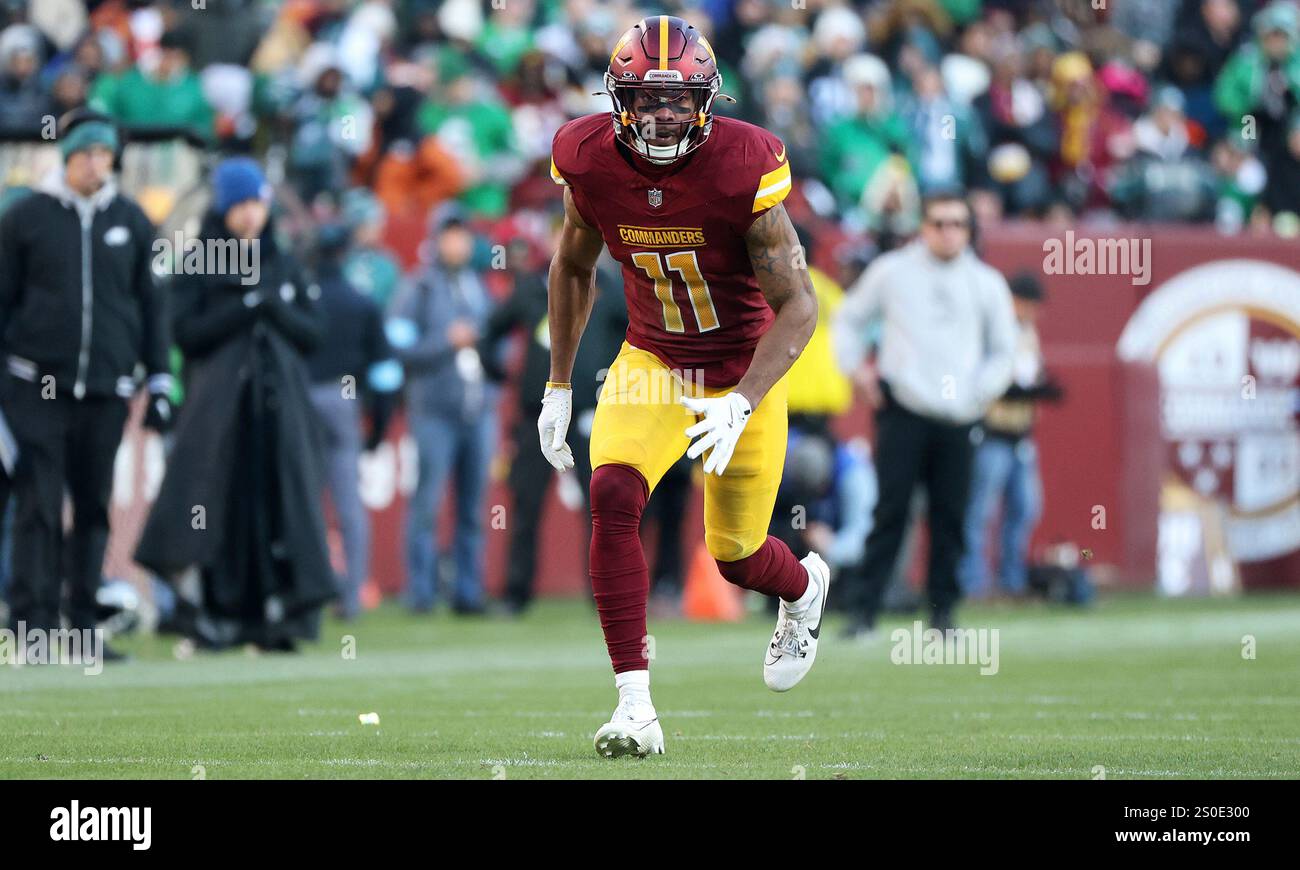 Washington Commanders safety Jeremy Chinn (11) rushes during an NFL ...