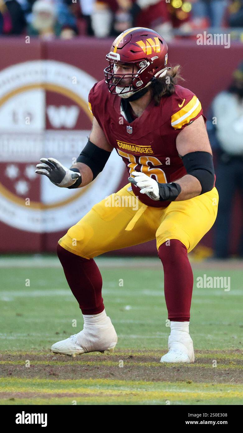 Washington Commanders guard Sam Cosmi (76) blocks during an NFL ...