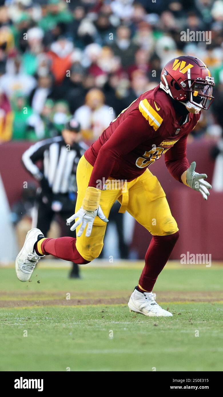 Washington Commanders defensive end Clelin Ferrell (99) rushes during ...