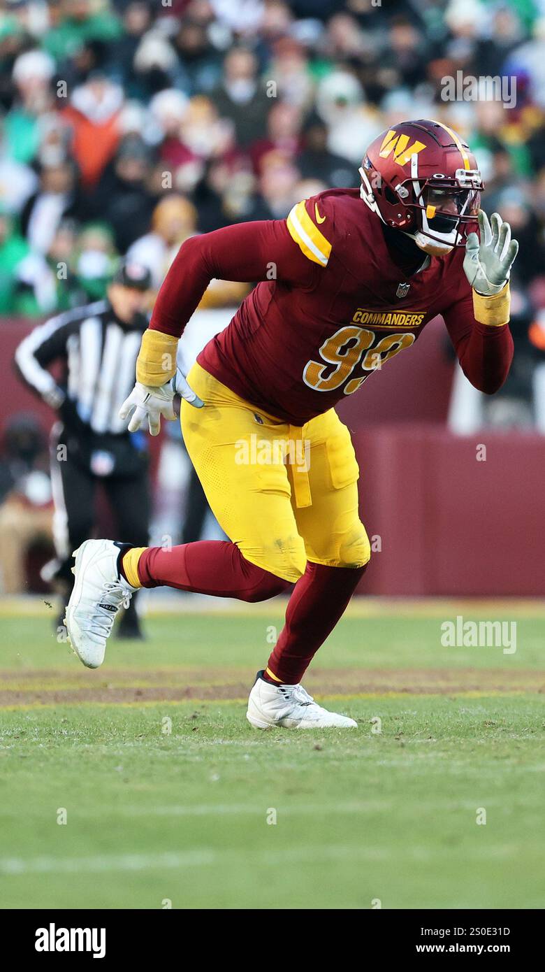 Washington Commanders defensive end Clelin Ferrell (99) rushes during ...