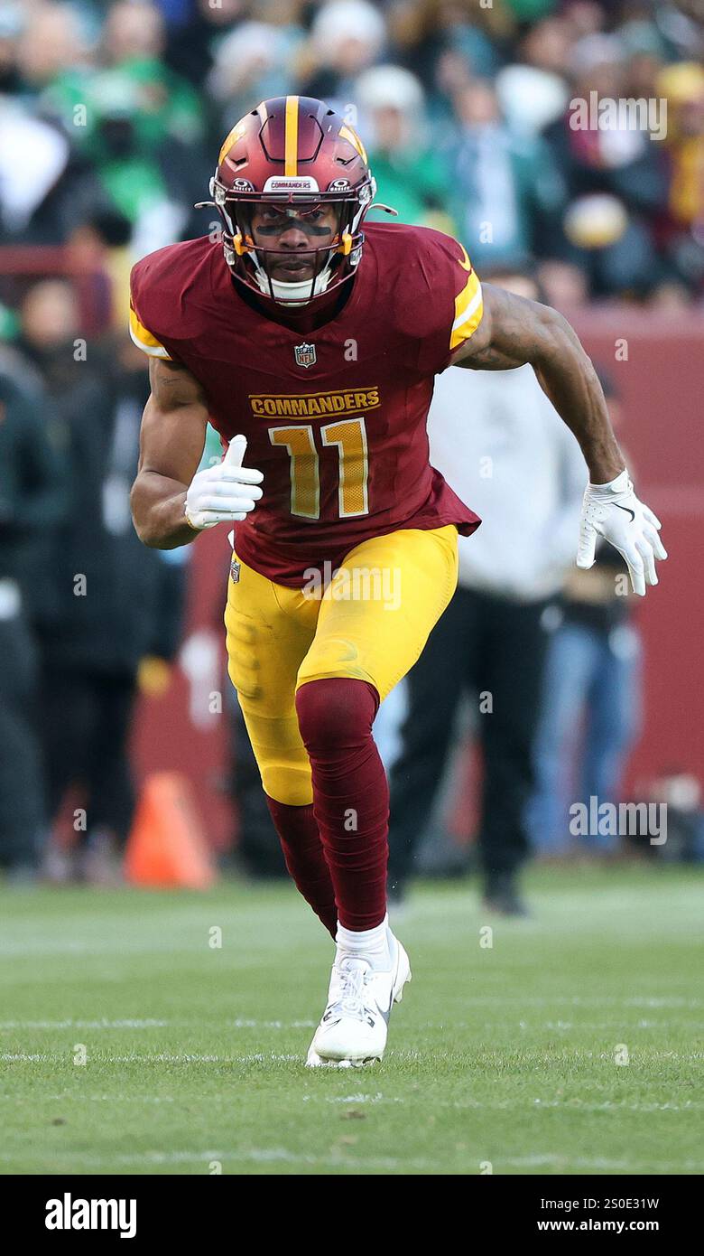 Washington Commanders safety Jeremy Chinn (11) rushes during an NFL ...