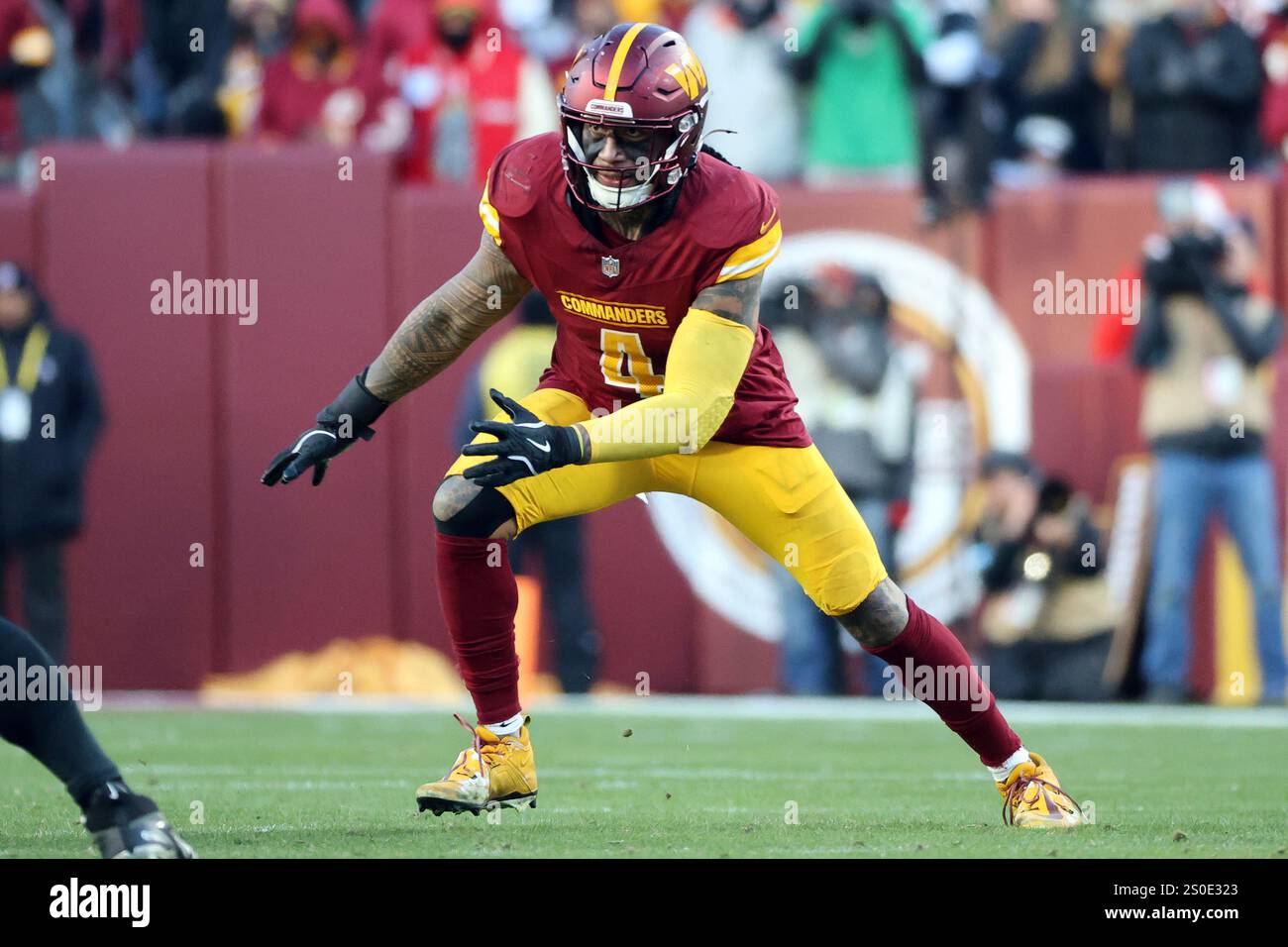 Washington Commanders linebacker Frankie Luvu (4) rushes during an NFL ...