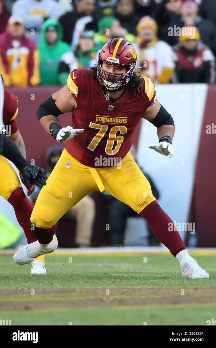 Washington Commanders guard Sam Cosmi (76) blocks during an NFL ...