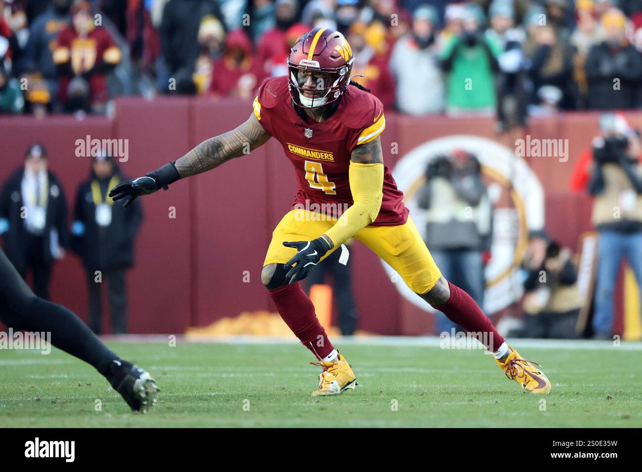 Washington Commanders linebacker Frankie Luvu (4) rushes during an NFL ...