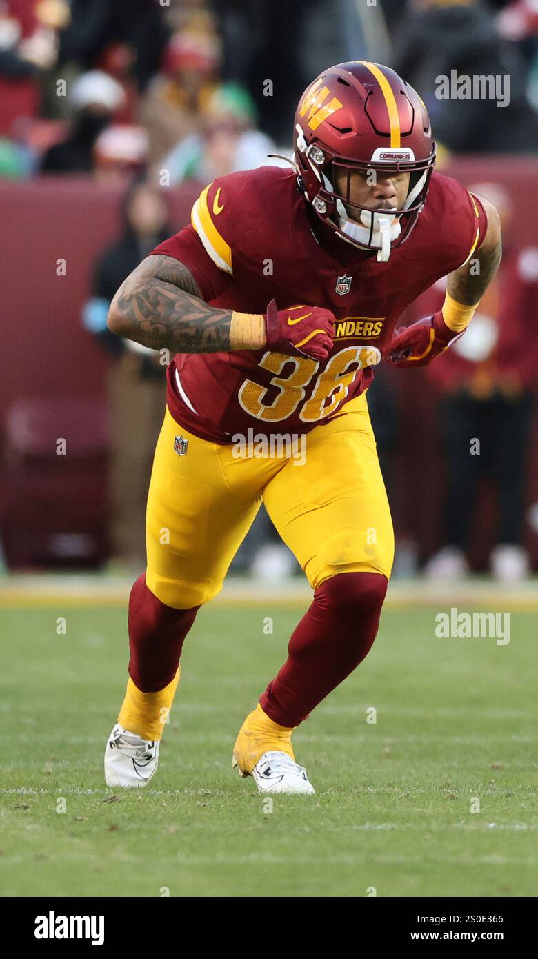 Washington Commanders running back Chris Rodriguez Jr. (36) runs a ...