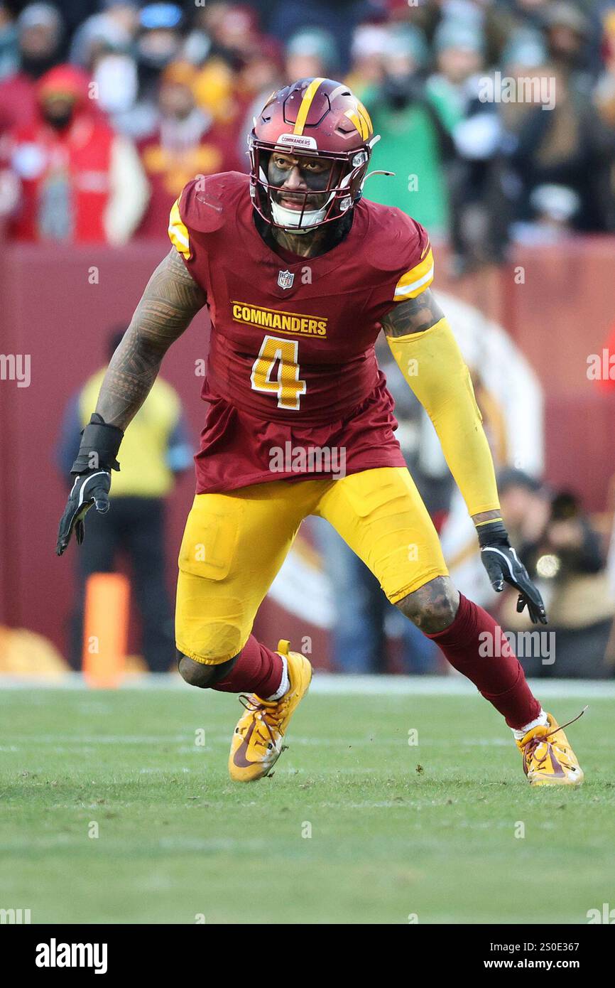 Washington Commanders linebacker Frankie Luvu (4) rushes during an NFL ...
