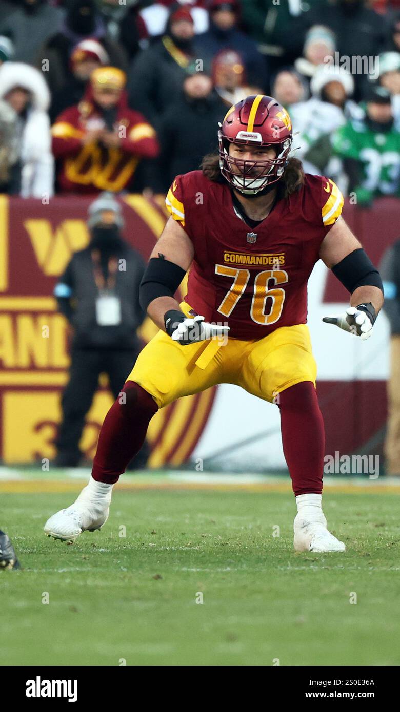 Washington Commanders guard Sam Cosmi (76) blocks during an NFL ...