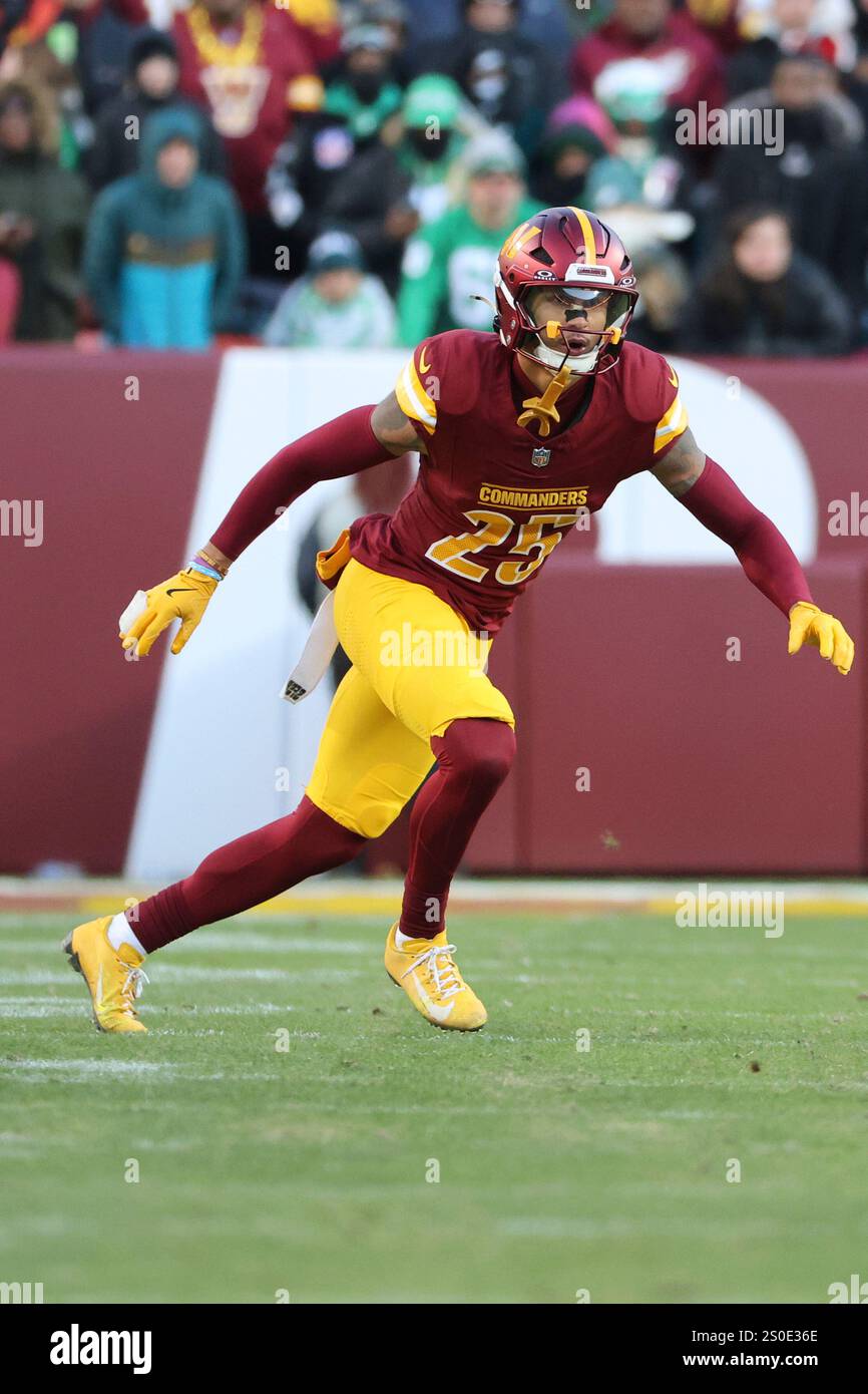 Washington Commanders cornerback Benjamin St-Juste (25) drops back into ...