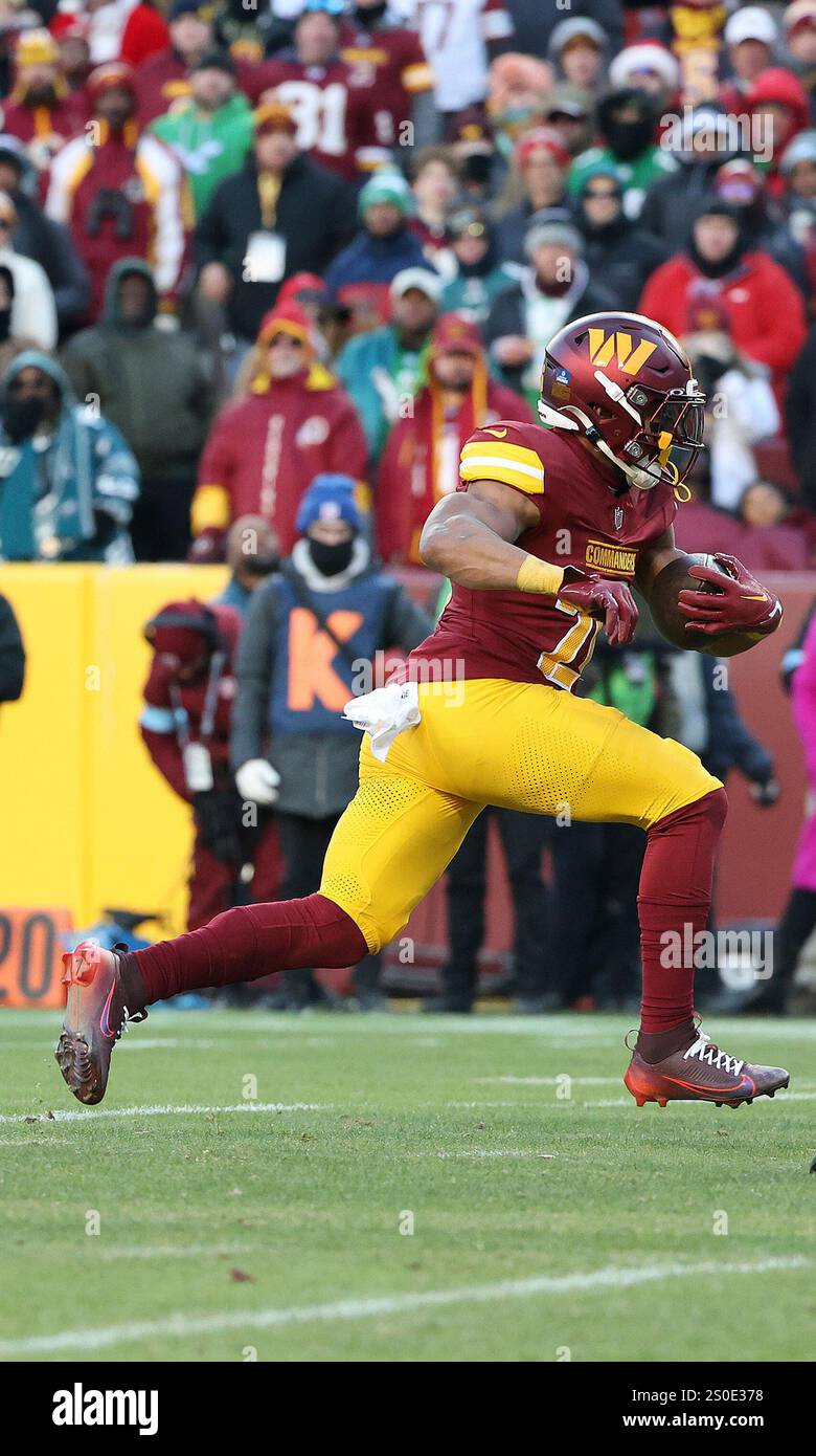 Washington Commanders running back Jeremy McNichols (26) runs with the ...