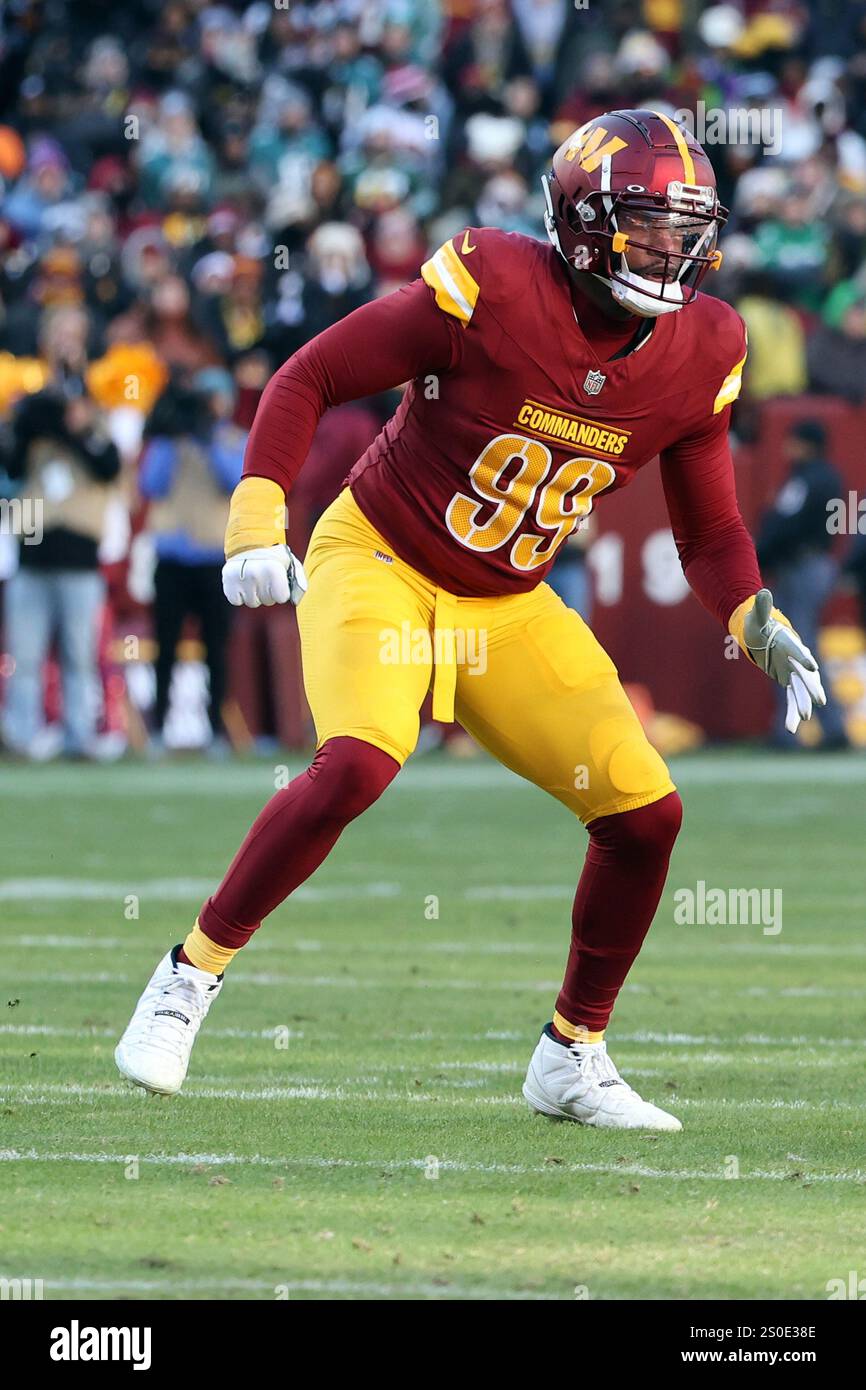 Washington Commanders defensive end Clelin Ferrell (99) rushes during ...