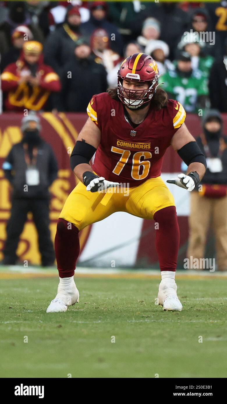 Washington Commanders guard Sam Cosmi (76) blocks during an NFL ...