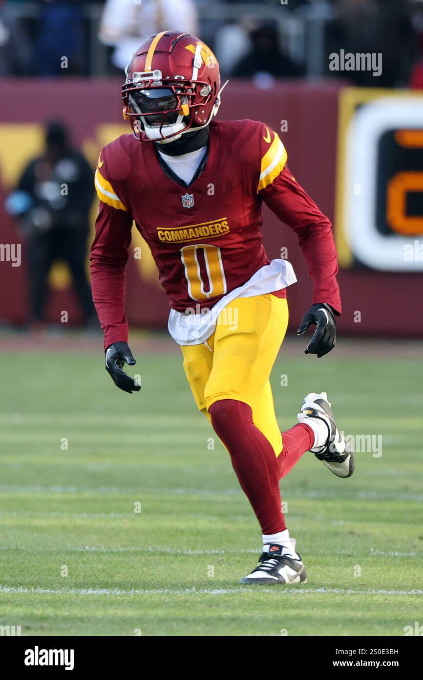 Washington Commanders cornerback Mike Sainristil (0) rushes during an ...