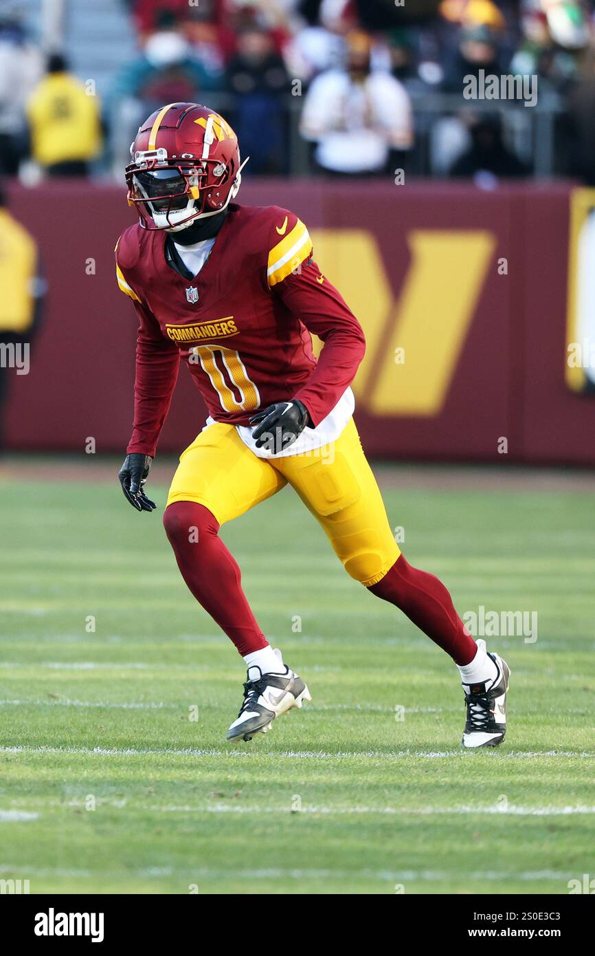 Washington Commanders cornerback Mike Sainristil (0) rushes during an ...