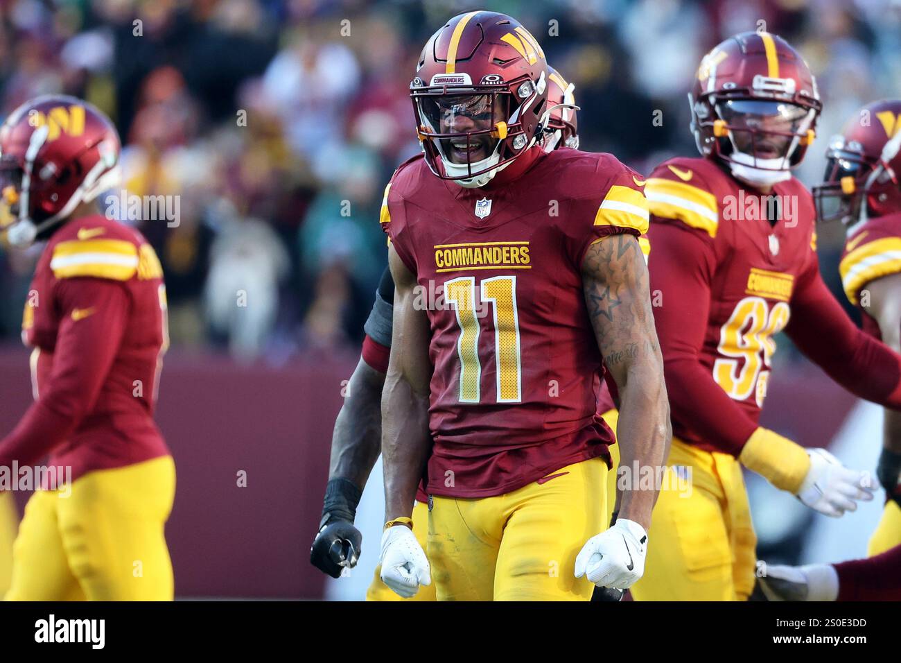 Washington Commanders safety Jeremy Chinn (11) celebrates during an NFL ...
