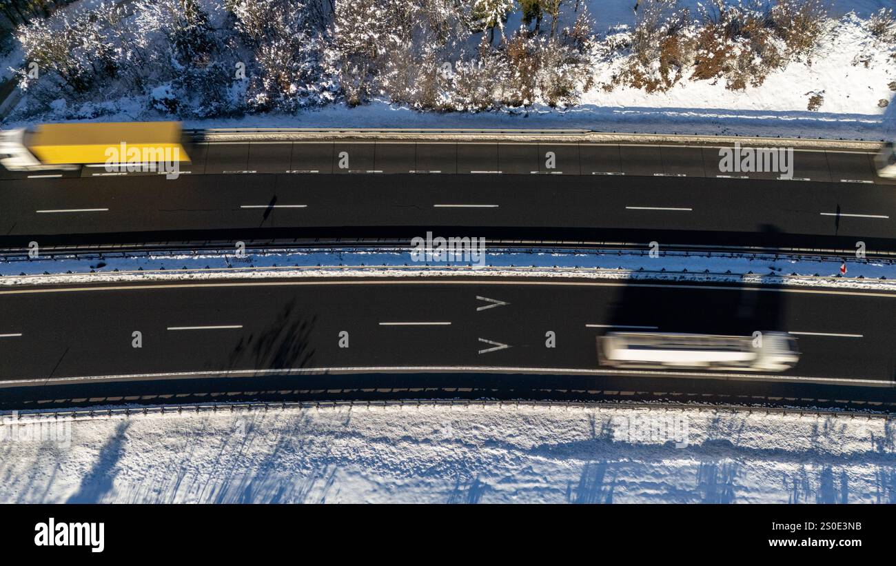 Aerial truck on snowy road hi-res stock photography and images - Alamy