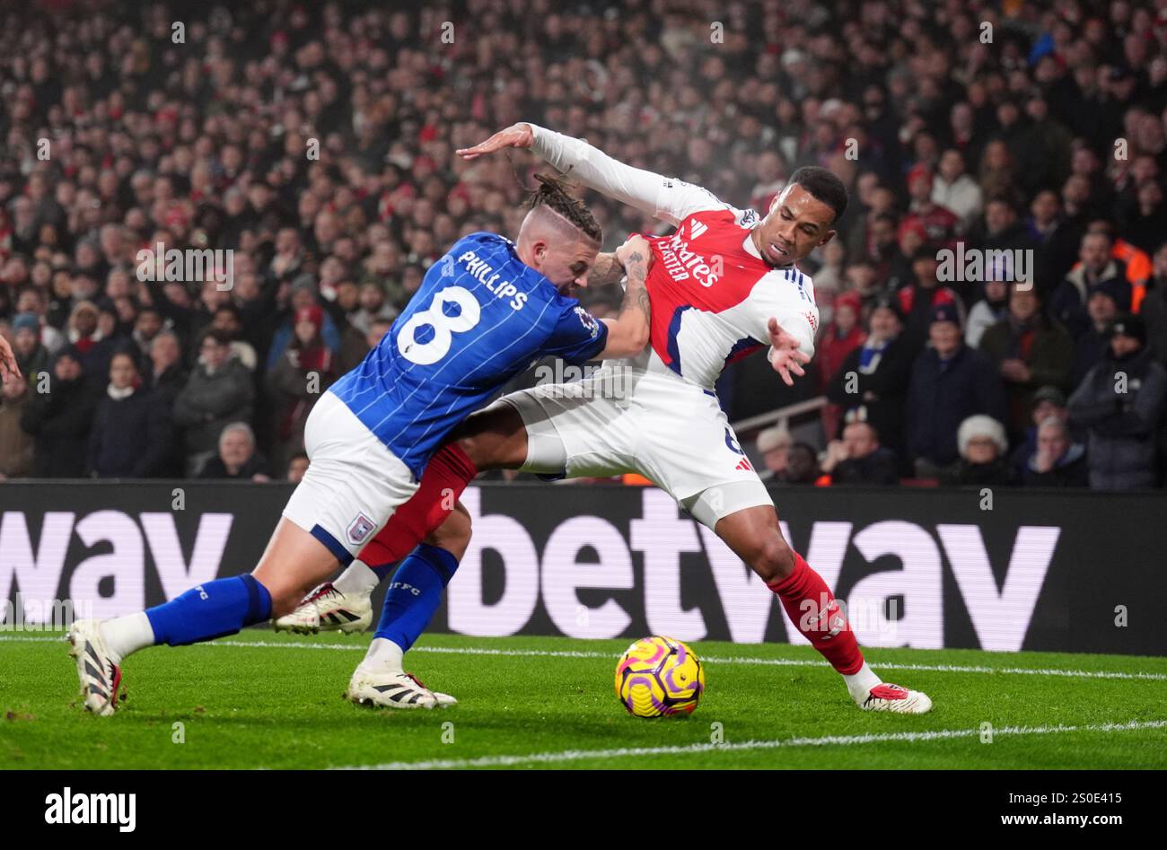 Ipswich Town's Kalvin Phillps (left) and Arsenal's Gabriel (right ...