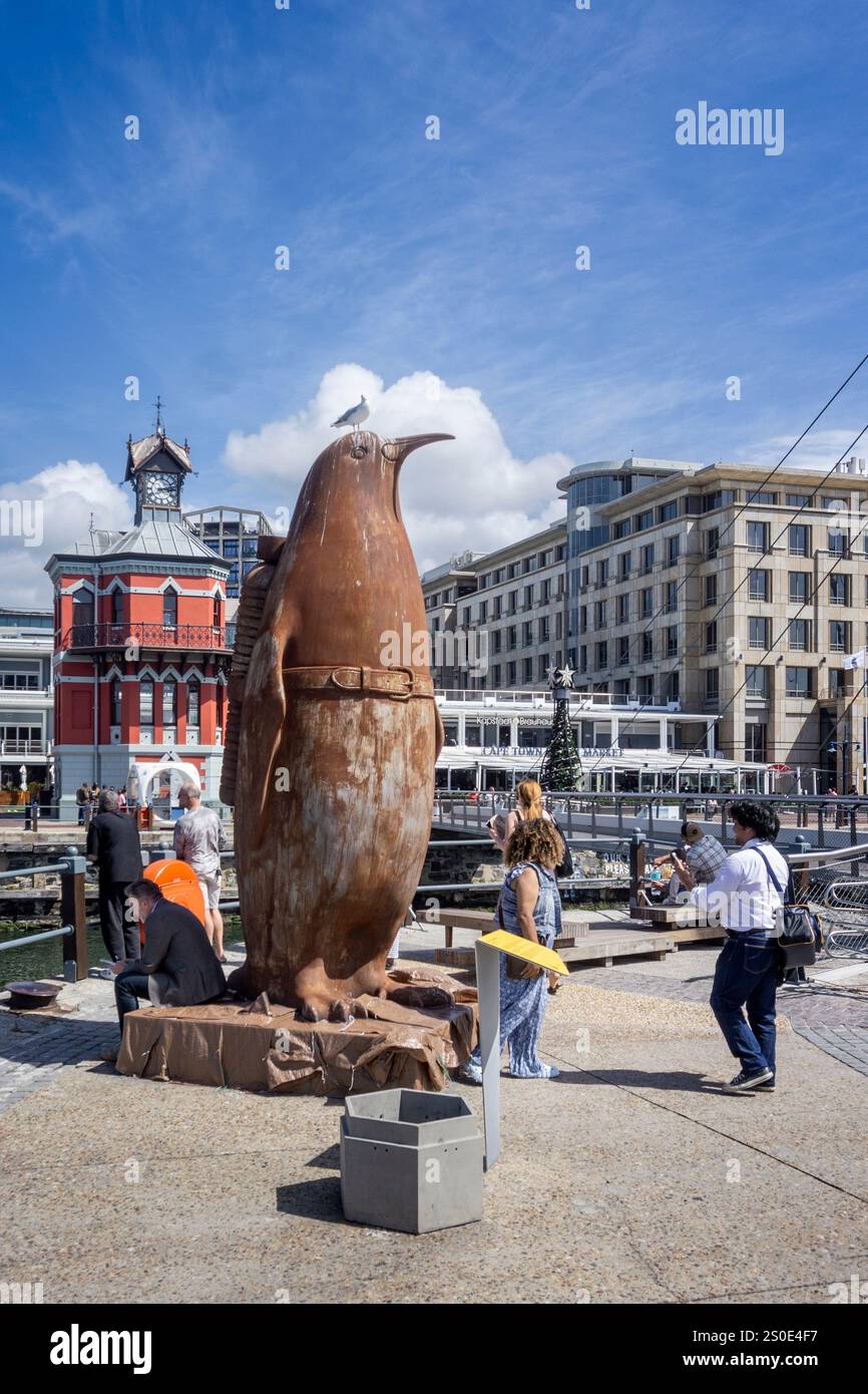 Giant Penguin statue and clock tower at the V&A Waterfront in Cape Town ...
