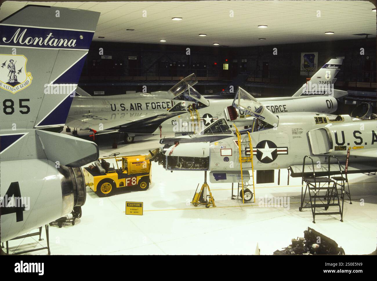 F-106As inside maintenance hangar. Careful positioning permitted ...