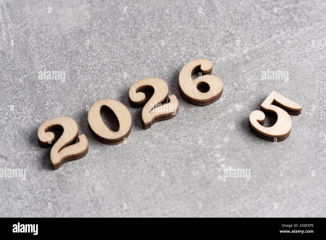New Year 2026. Wooden numbers on gray background. Copy space Stock ...