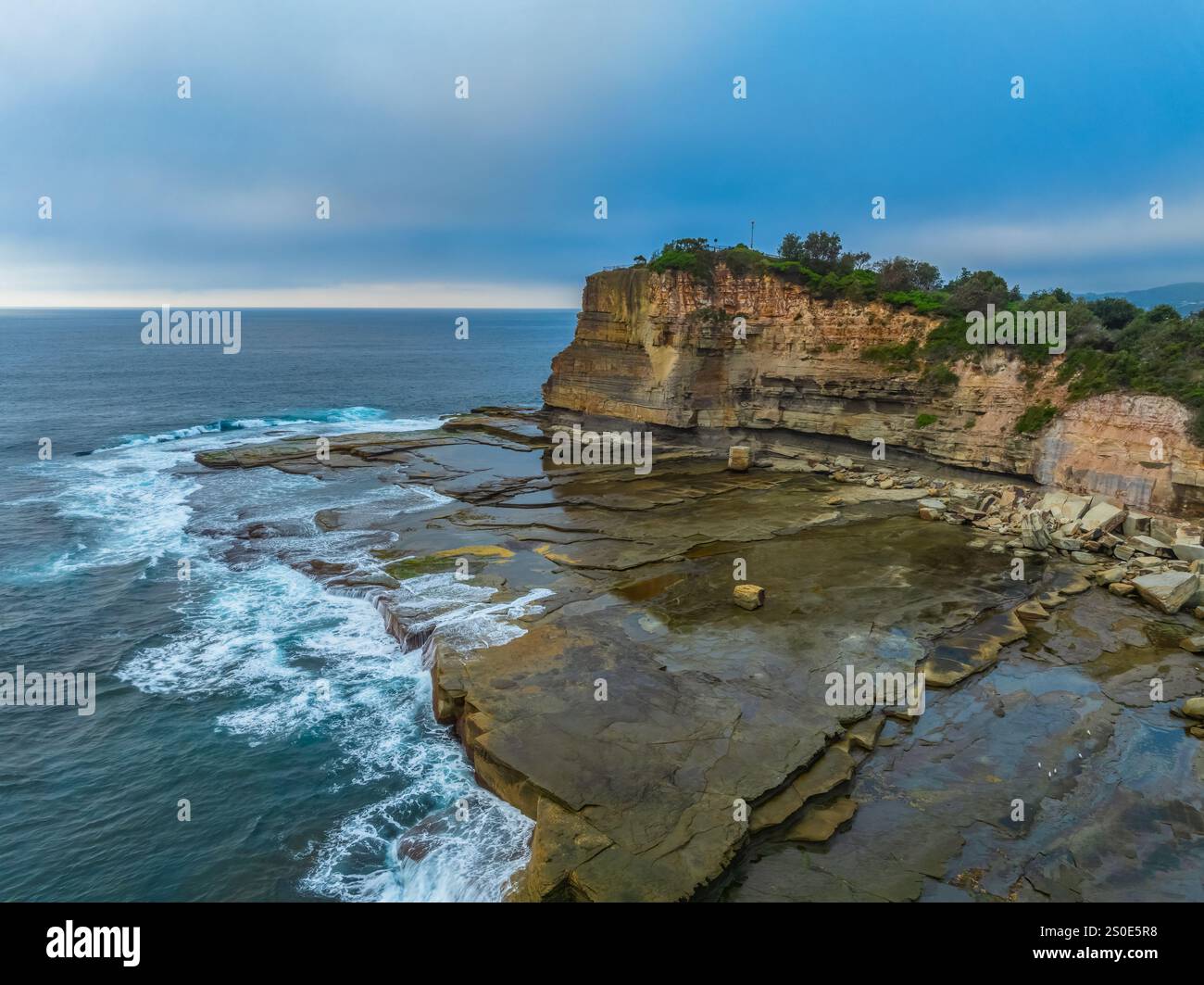 Aerial sunrise seascape with thick fog cloud at The Skillion in Terrigal, NSW, Australia Stock ...