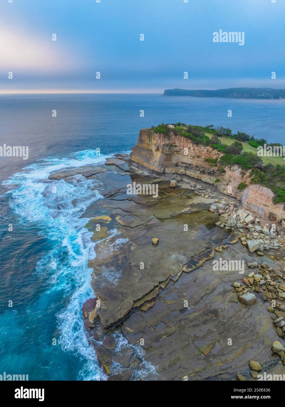 Aerial sunrise seascape with thick fog cloud at The Skillion in Terrigal, NSW, Australia Stock ...