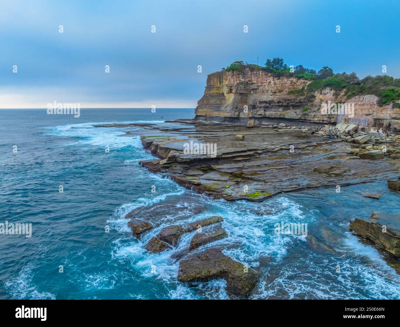 Aerial sunrise seascape with thick fog cloud at The Skillion in Terrigal, NSW, Australia Stock ...