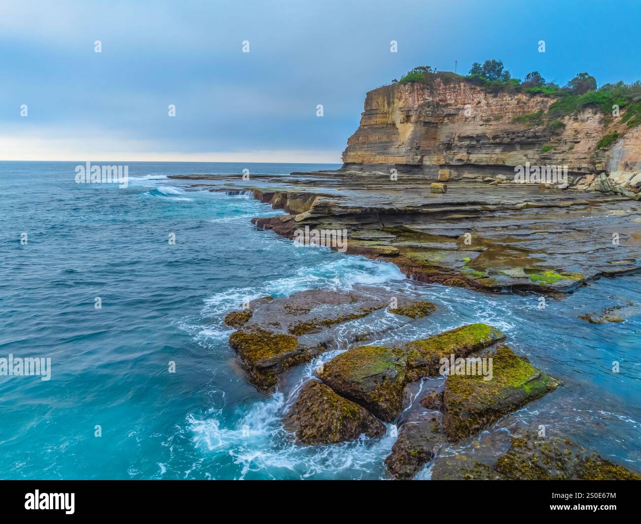 Aerial sunrise seascape with thick fog cloud at The Skillion in Terrigal, NSW, Australia Stock ...