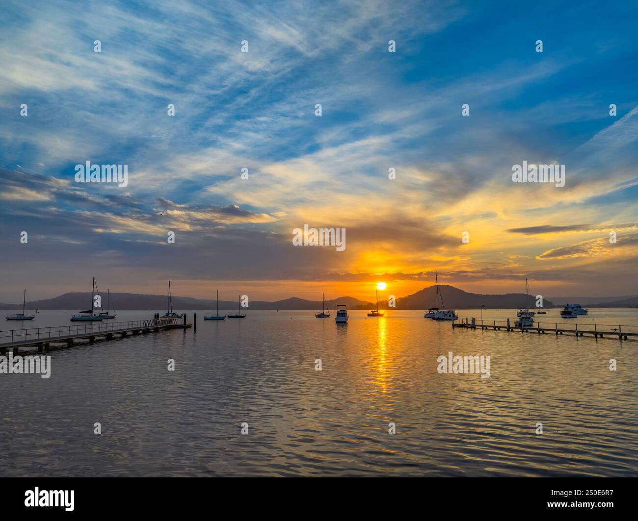 Subtle Sunrise with smoke haze and high cloud over Brisbane Water from ...