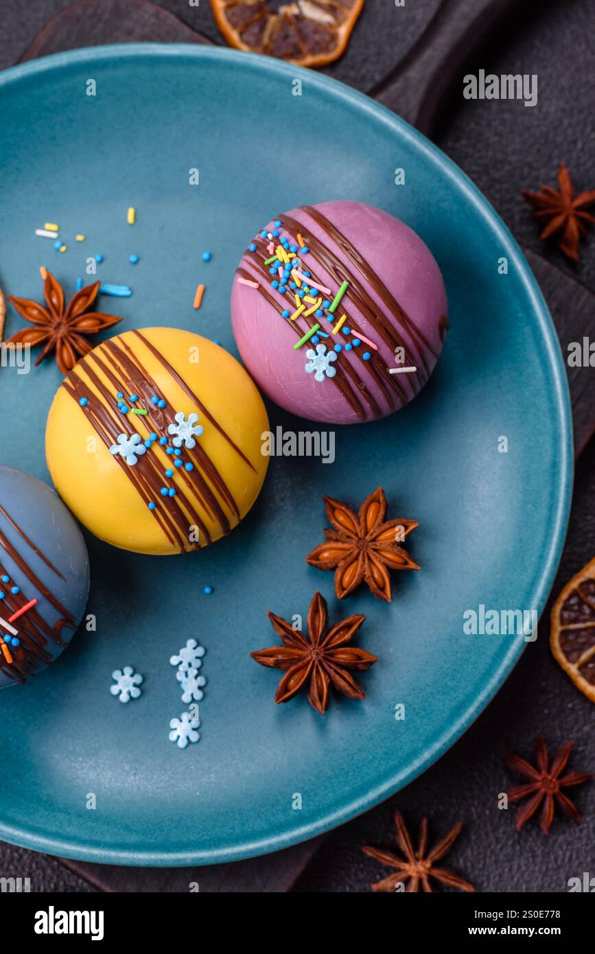 Sweet cocoa bombs with marshmallows and chocolate for making a drink ...