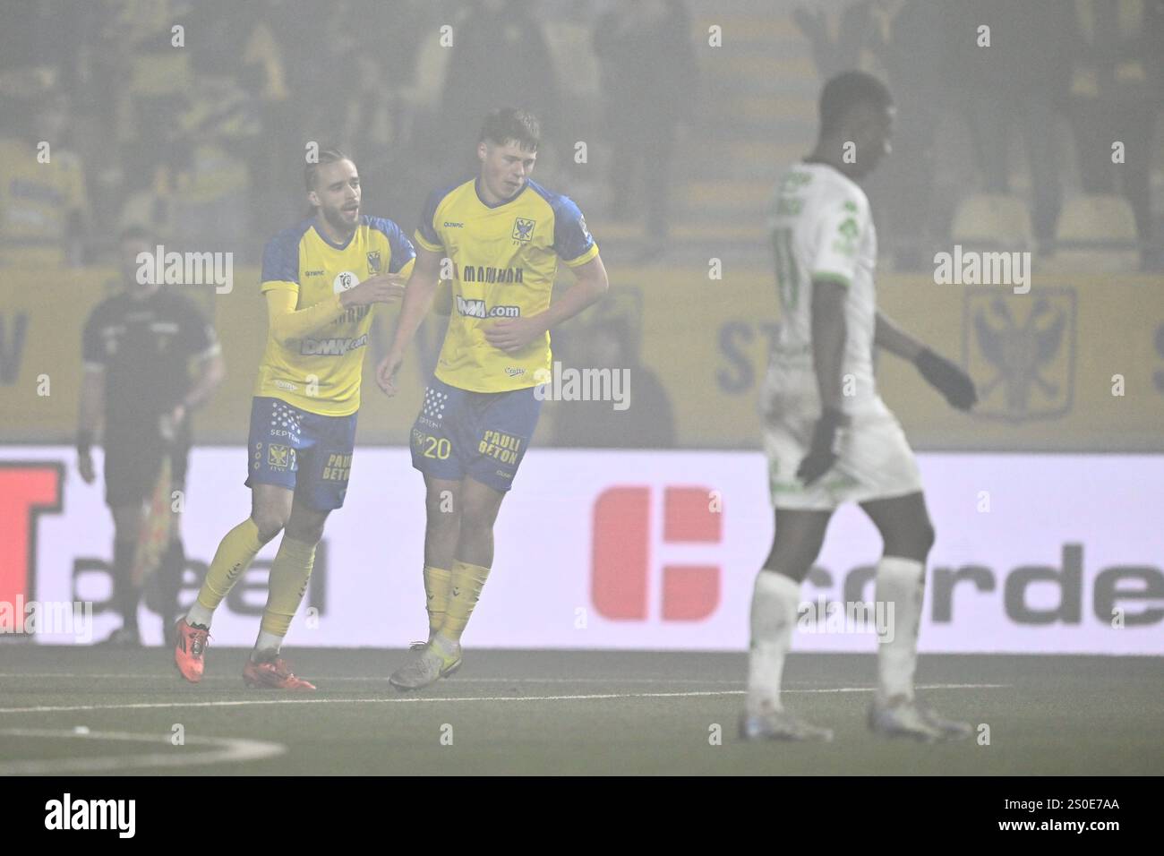 Sint Truiden, Belgium. 27th Dec, 2024. STVV's Bilal Brahimi and STVV's ...